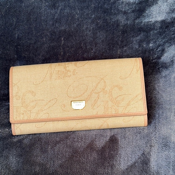 Nina Ricci | Bags | Nina Ricci Tan And Brown Coated Canvas With Leather ...